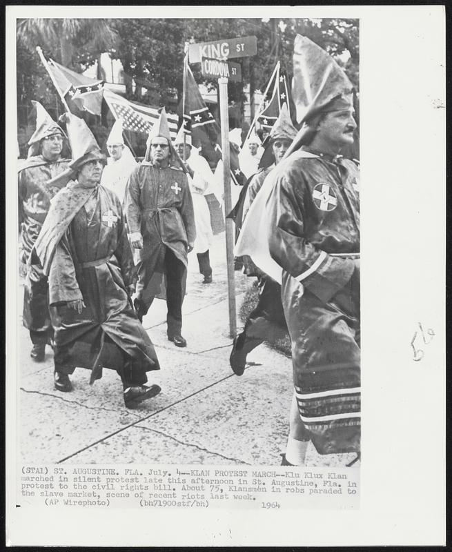 Klan Protest March--Klu Klux Klan marched in silent protest late this ...