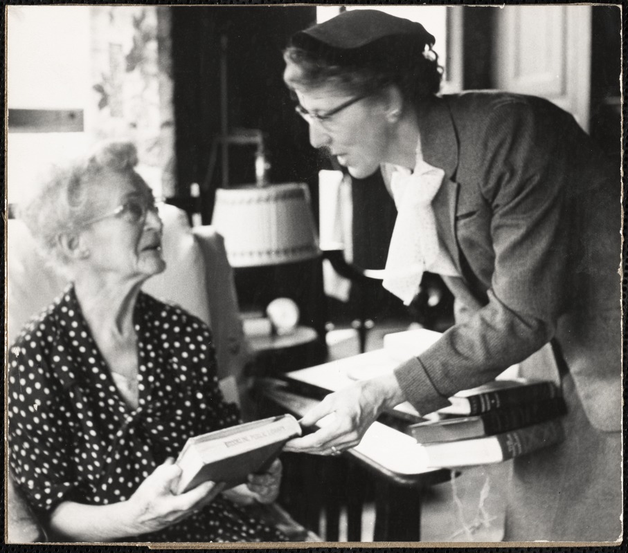 Miss Thompson, head of circulation dept., delivers books to shut-ins ...