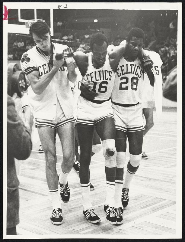 Tom Sanders is helped off court, after sustaining leg injury. - Digital ...