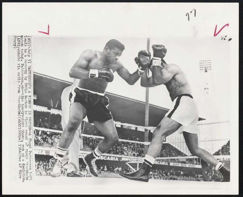 Patterson's a Winner in Sweden--A Floyd Patterson left leads to a ...