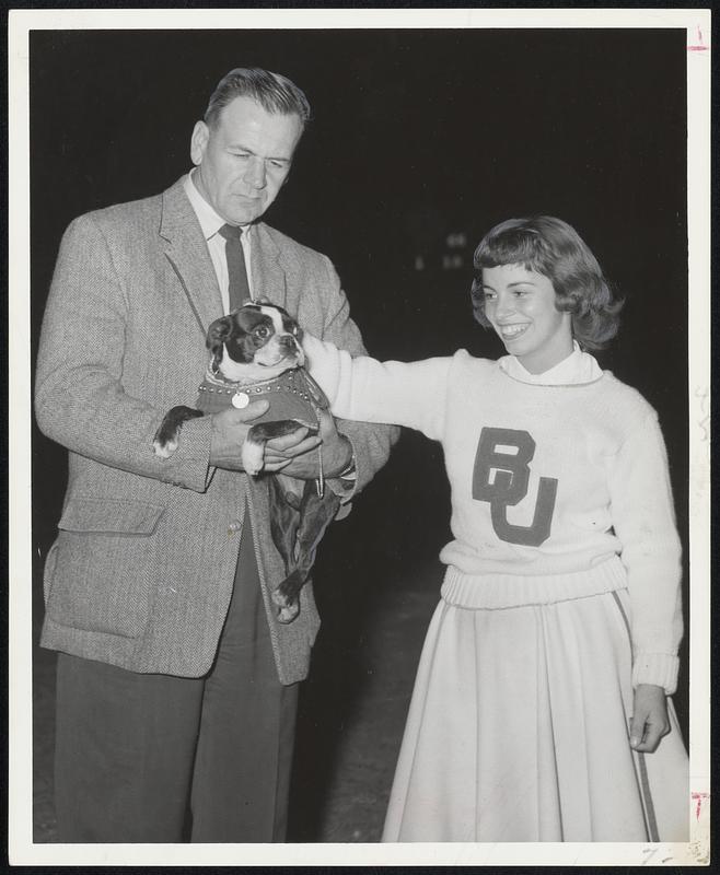 Boston University Football coach Steve Sinko holds Ch. Flash Again ...
