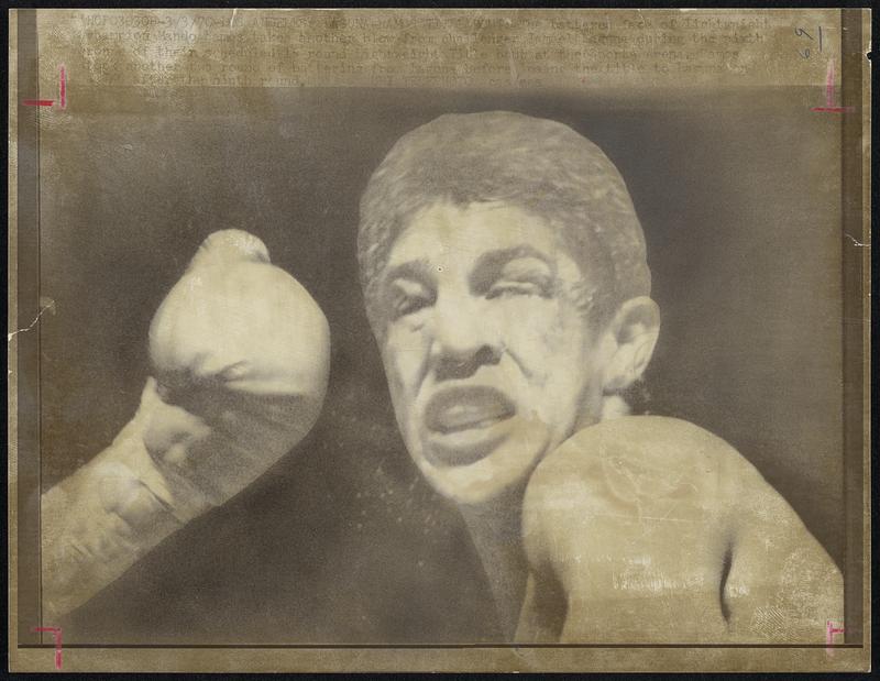 Ramos Title Bout: The battered face of lightweight champion Mando Ramos ...