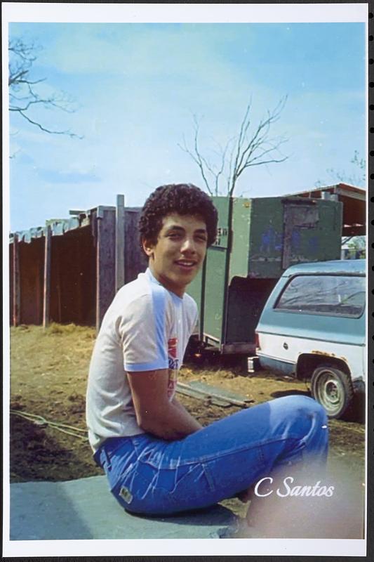 Luis Denizard sitting on mounting block - Digital Commonwealth