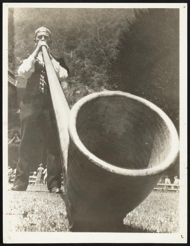 It's a Horn- Looks like a pipe, but it's an Alpine horn. A good "blower ...