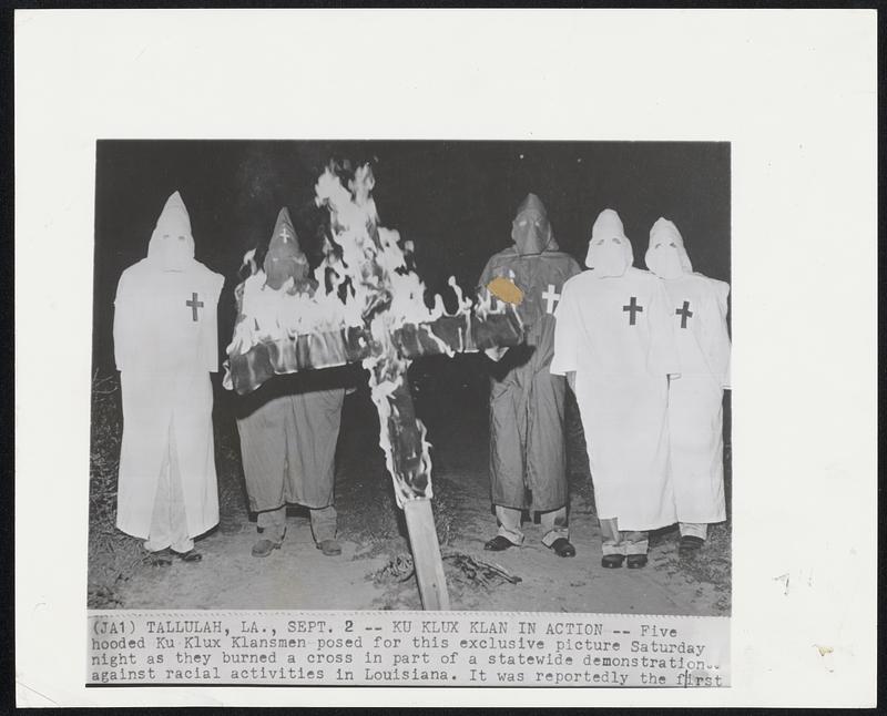 Ku Klux Klan In Action-- Five hooded Ku Klux Klansmen posed for this ...