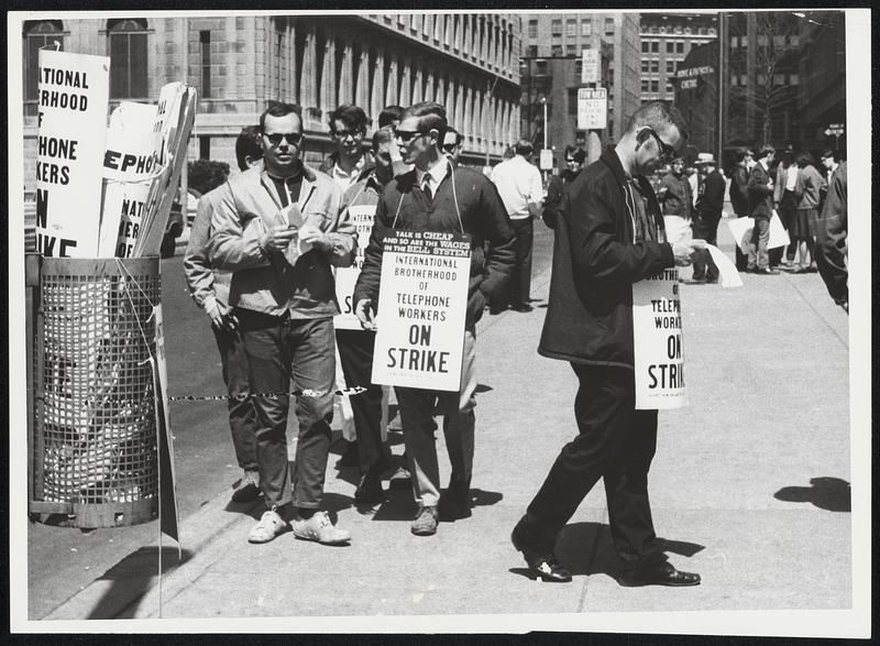 Mass Picket Lines of striking Telephone Company workers circling ...