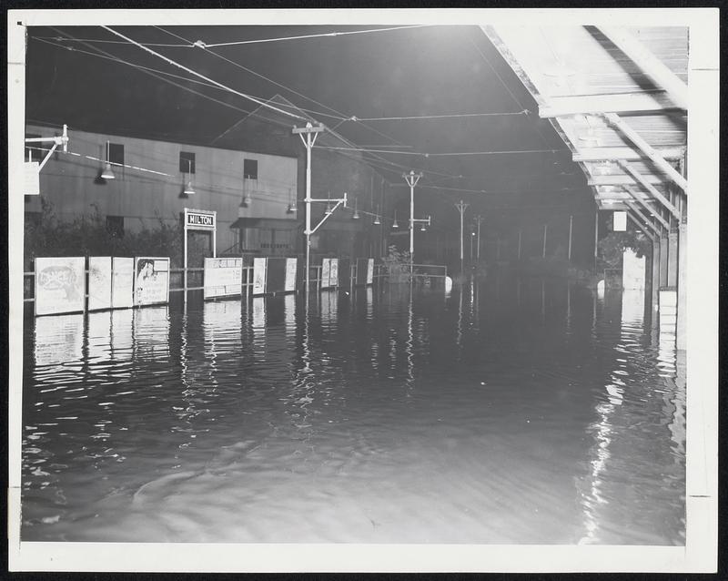 No Train Today-The Milton M. T. A. station stands quiet as water from ...