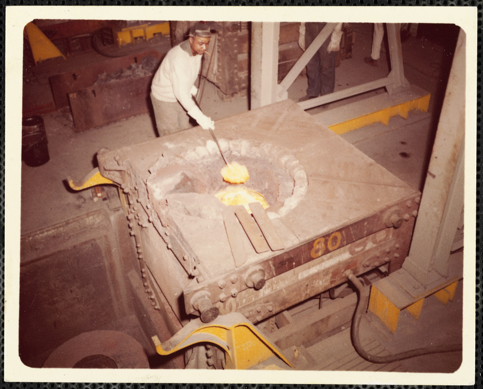 Man stoking furnace - Digital Commonwealth