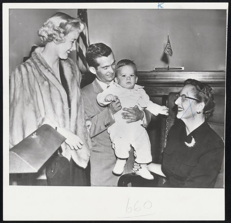 Wee Willie Shoemaker and his wife, Virginia, show off their adopted son ...