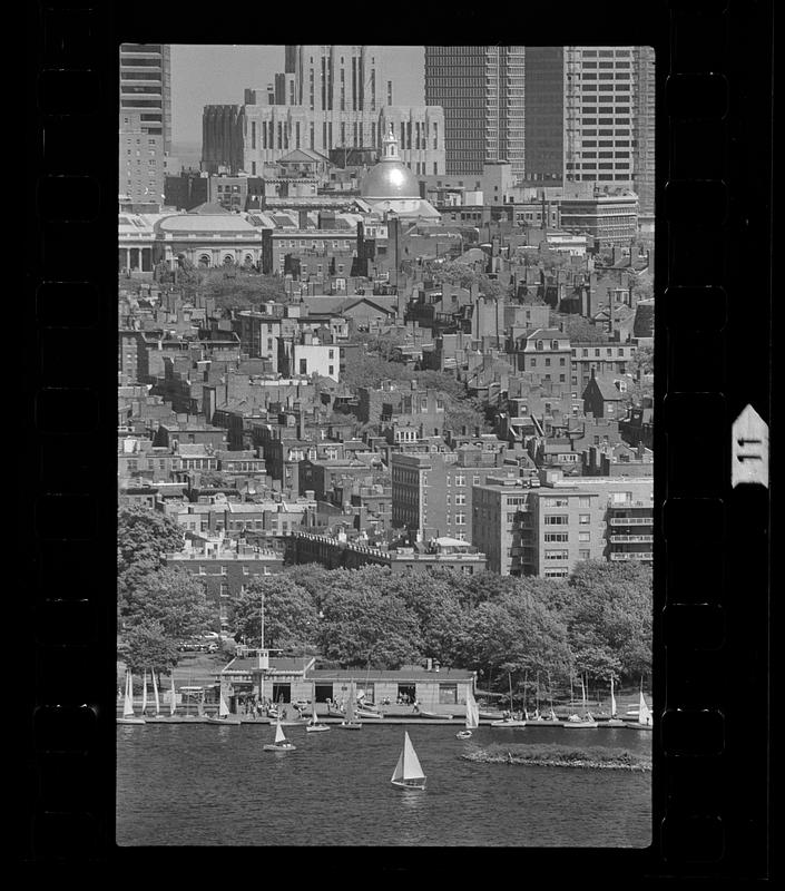 Sailboats on Charles River Basin with Beacon Hill in background ...
