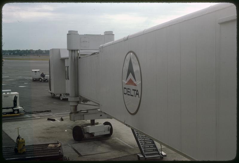 Jet bridge with Delta logo - Digital Commonwealth