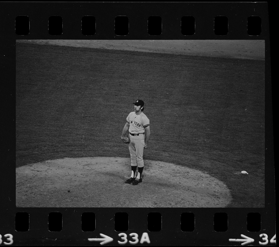 New York Yankees relief pitcher Sparky Lyle (#28) standing on the ...