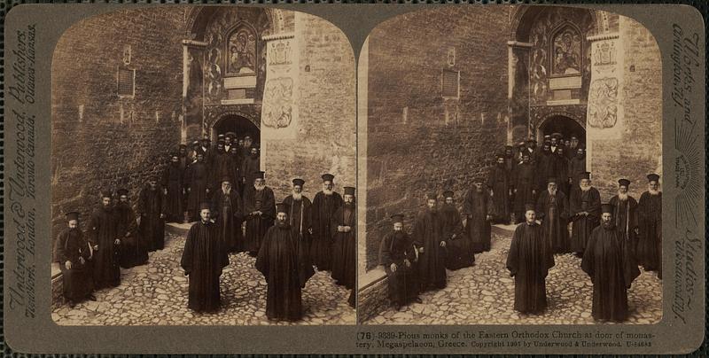 Pious monks of the Eastern Orthodox Church at door of monastery ...