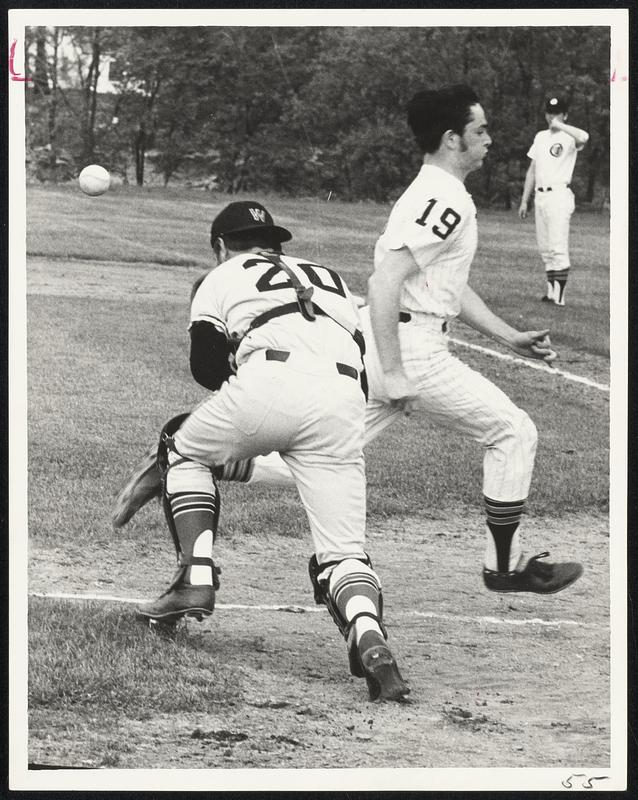 Knocking "Win" From Winchester is Woburn's Jim Lynch, who crosses plate ...