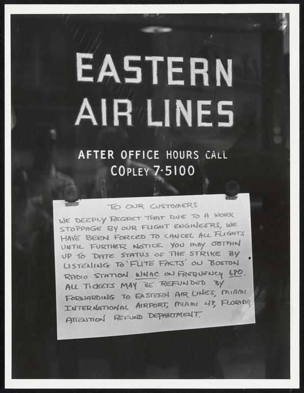 Handwritten sign on Eastern Air Lines office door which states, "To our ...