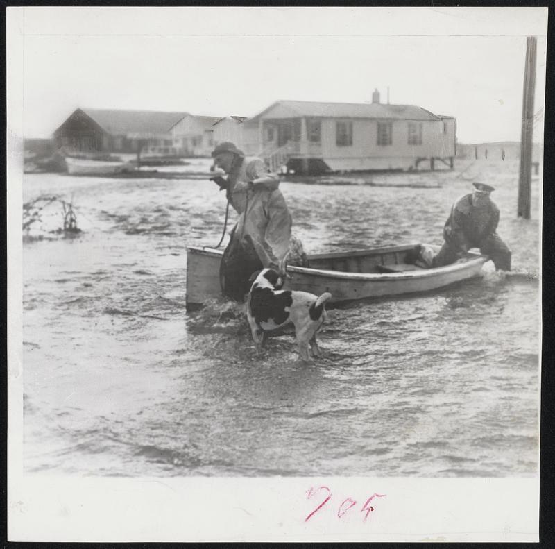 Man Your Boat is the cry as Police Lt. C. M. Blomberg (front) drags a ...