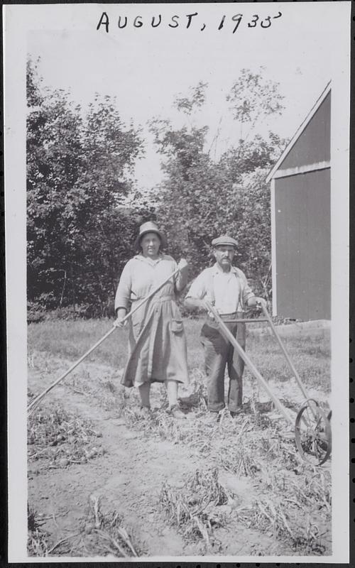 Hiram and Julia Zoly cultivating the garden - Digital Commonwealth