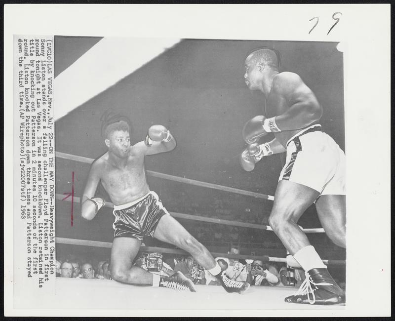 On the Way Down-- Heavyweight Champion Sonny Liston stands over a ...
