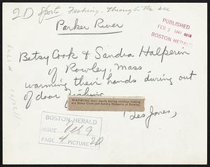 Warming their hands during outdoor fishing are Betsy Cook and Sandra ...