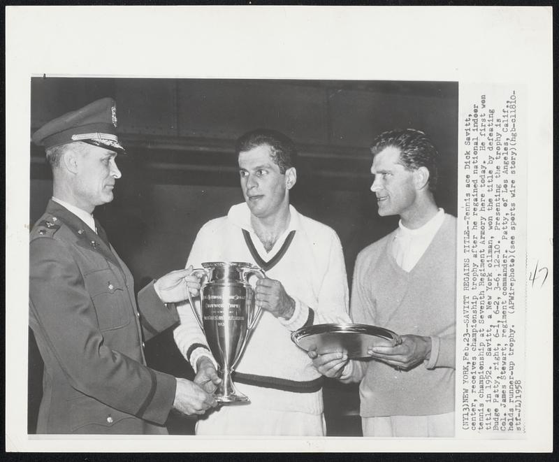 Savitt Regains Title--Tennis ace Dick Savitt, center, receives ...
