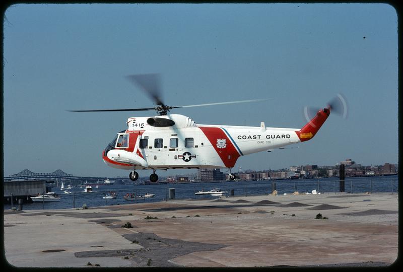 Coast Guard helicopter taking off, North End, Boston - Digital Commonwealth