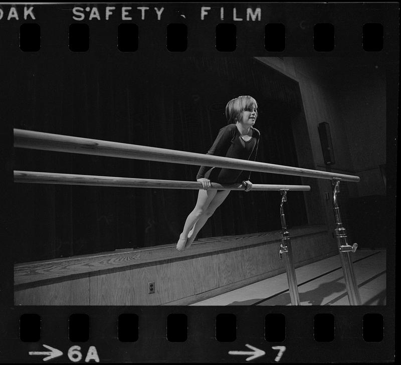 Bruce Irving's child doing gymnastics - Digital Commonwealth