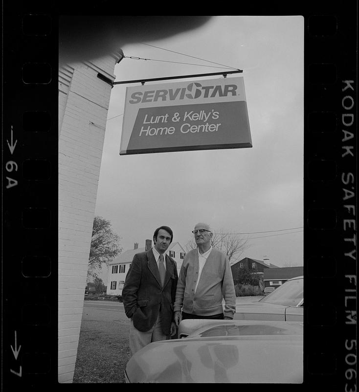 Peter and Edward Kelly under sign for Lunt & Kelly's Home Center ...