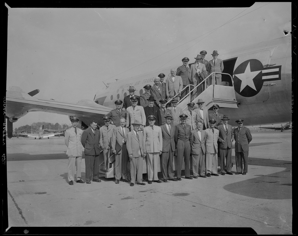 Group photo of the crew boarding a plane - Digital Commonwealth