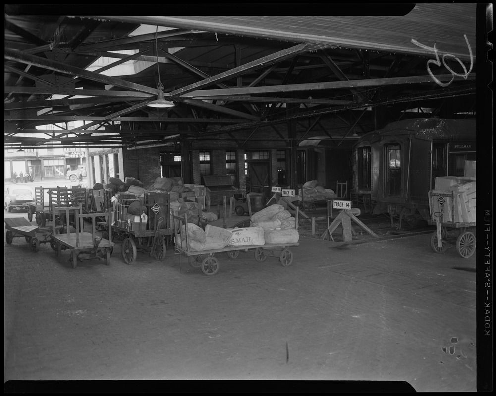 US Mail carts at train track depot - Digital Commonwealth