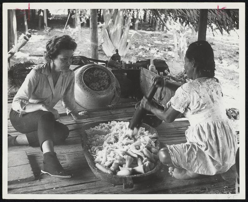 Betty Adams with Inca native watches as a Peruvian Indian woman in ...