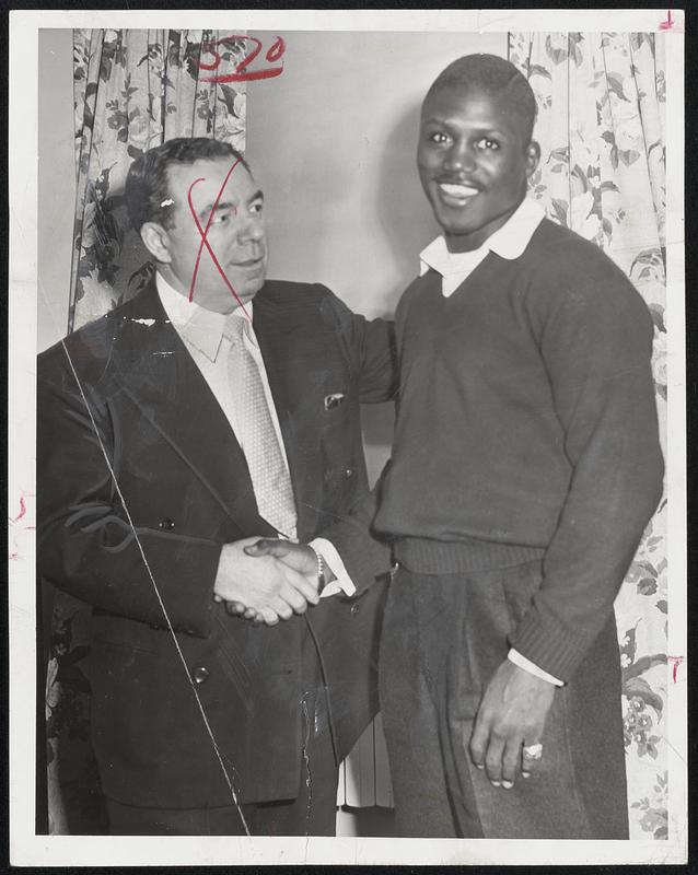In Town for Title Bout is Johnny Saxton, right, welterweight champion ...