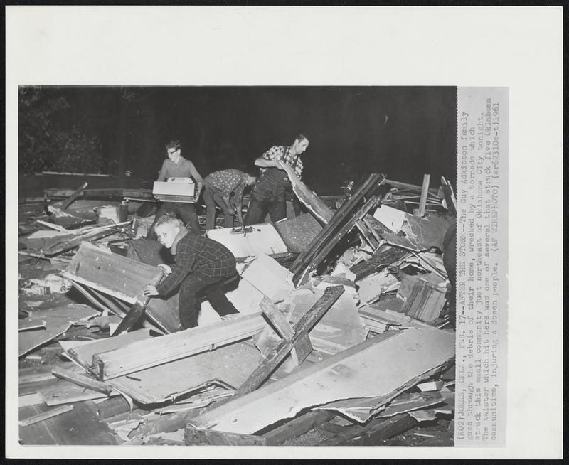 After the Storm--The Guy Adkisson family goes through the debris of ...