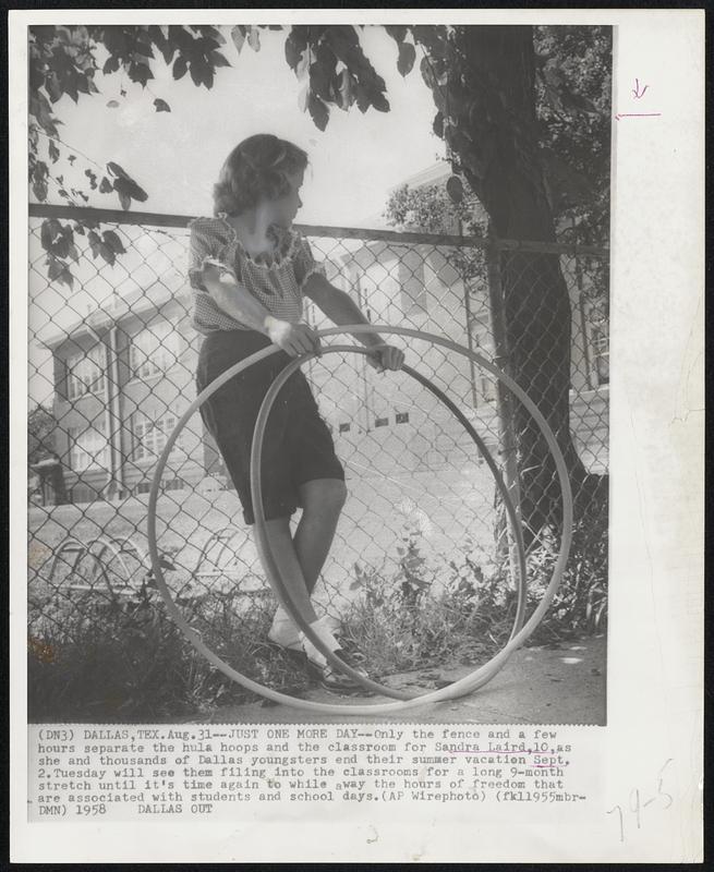 Just One More Day--Only the fence and a few hours separate the hula ...