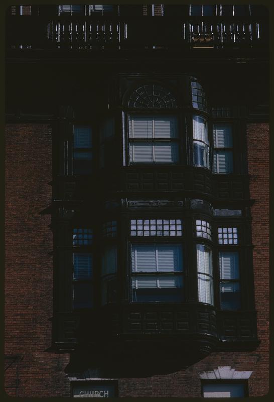 Double bay window on brick wall - Digital Commonwealth