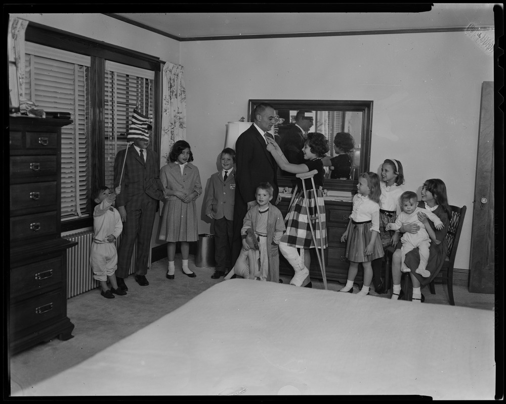 Kathy Bellotti, with crutch and leg in cast, fixing her father Frank ...