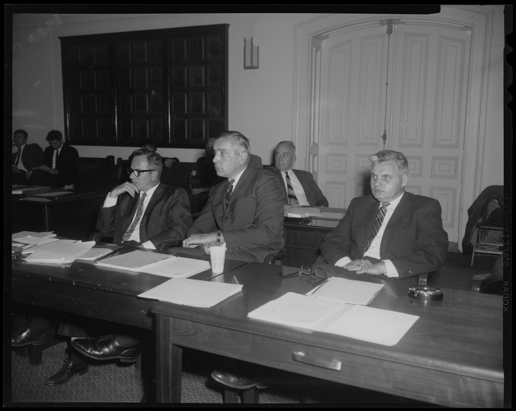 Men seated at tables, listening - Digital Commonwealth