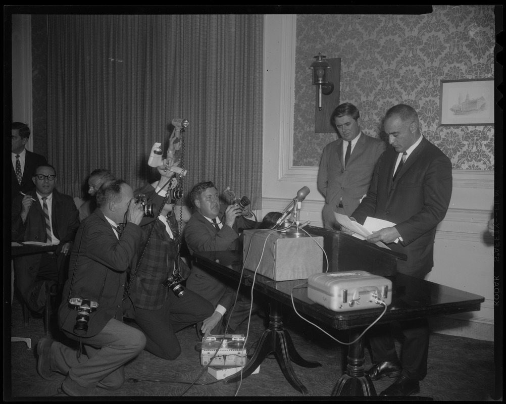 Candidate for attorney general Francis X. Bellotti at podium, holding ...