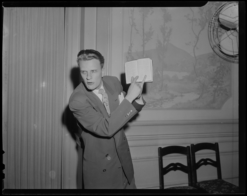 Billy Graham speaking and pointing to passage in the Bible - Digital ...