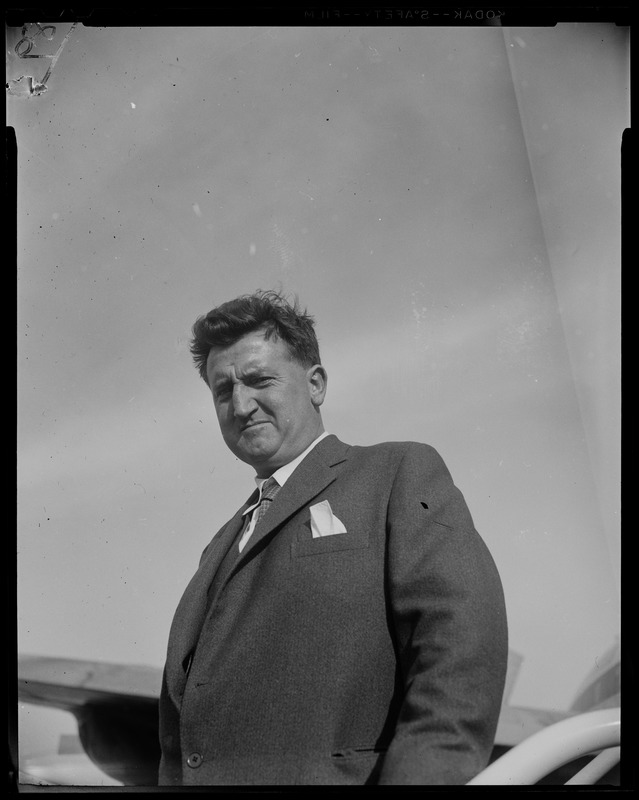 Brendan Behan exiting an airplane - Digital Commonwealth