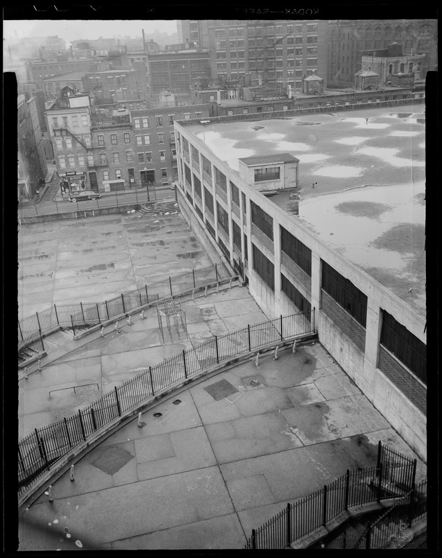 View of building with fenced-off areas from above - Digital Commonwealth