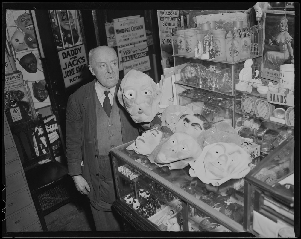 Man holding up a mask inside Daddy and Jack's Joke Shop - Digital ...