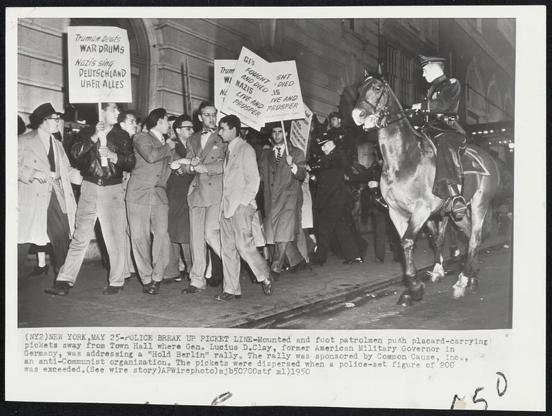 Police Break Up Picket Line-Mounted and foot patrolmen push placard ...