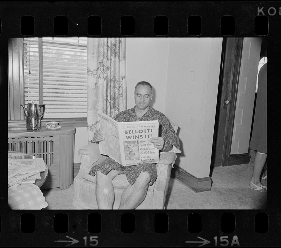 Francis X. Bellotti reading the newspaper the morning after defeating ...
