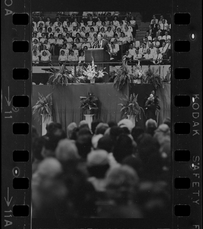 Billy Graham at Boston Garden with crowd in background and foreground ...