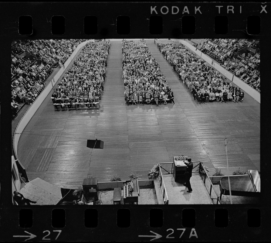 Billy Graham speaking at Boston Garden, crowd in front of him in three ...
