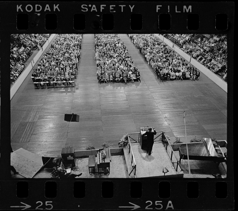 Billy Graham speaking at Boston Garden, crowd in front of him in three ...