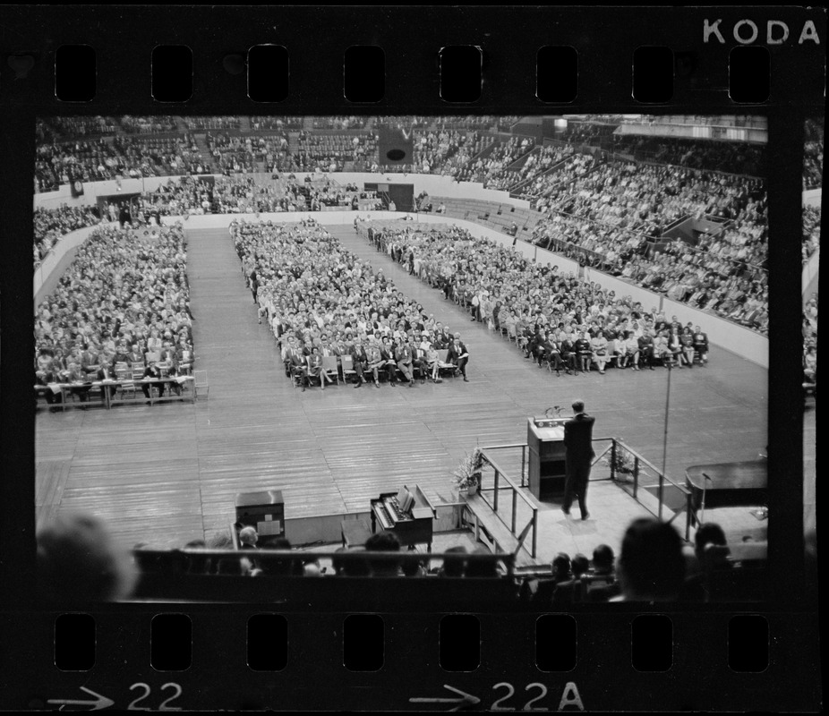 Billy Graham speaking at Boston Garden, crowd in front of him in three ...