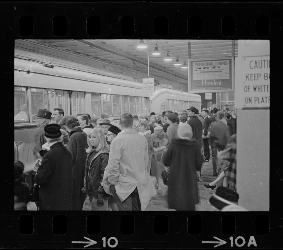 People on subway platform waiting in front of MTA train during Boston ...