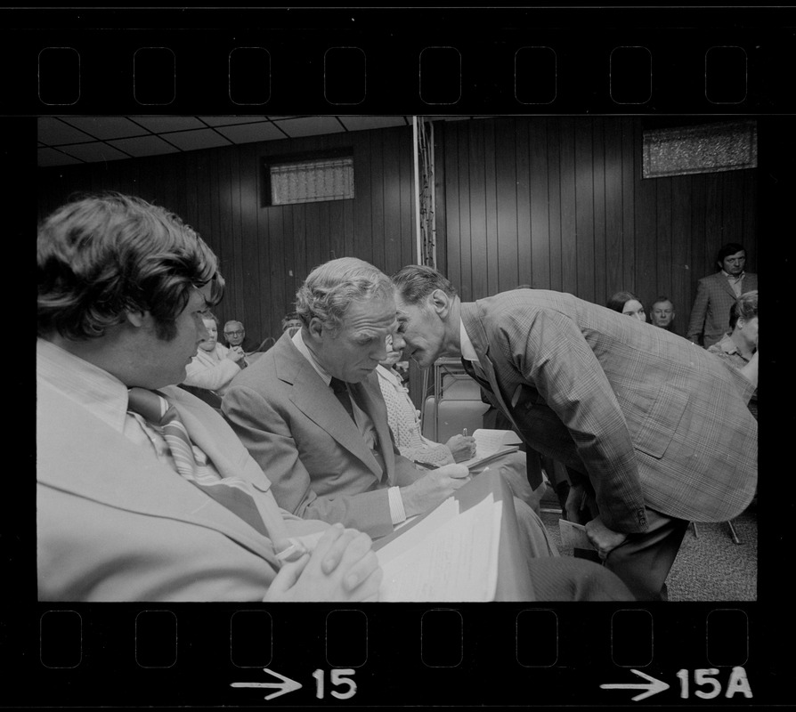 Man whispering to Boston Mayor Kevin White at meeting with the ...