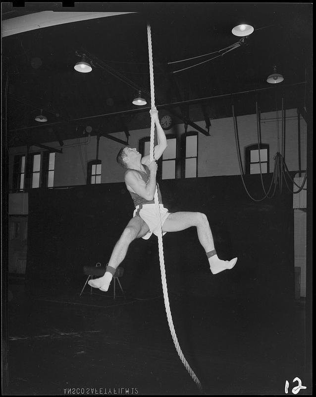 SC gymnast climbing rope - Digital Commonwealth